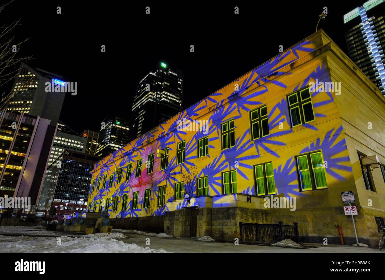 A light show lights up a building at the Glow winter light festival in ...