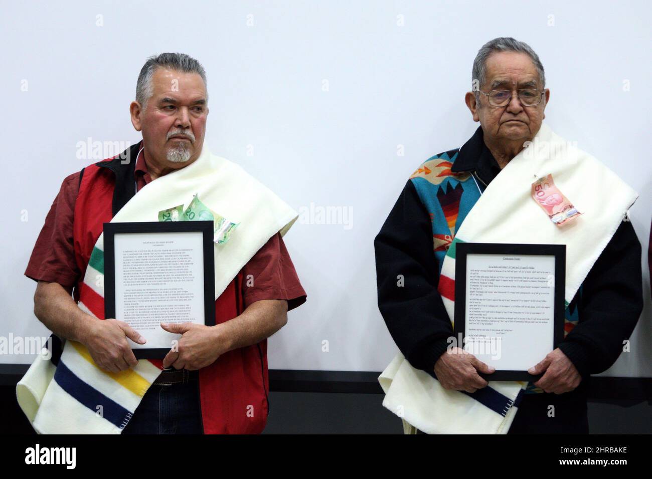 John Elliot, (left), a respected elder of the Tsartlip First Nation and ...
