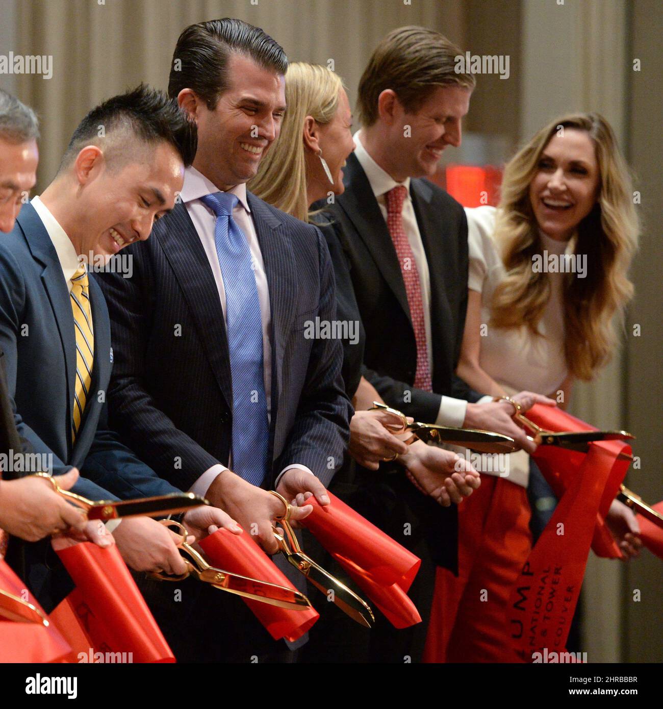 Developer Joo Kim Tiah (left to right) Donald Trump Jr., his wife ...
