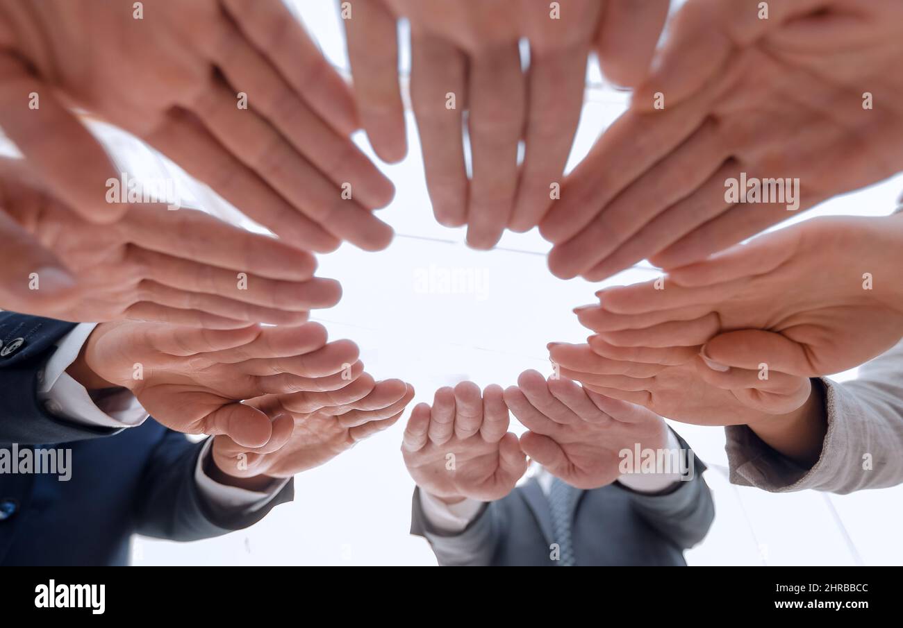 business team showing their unity Stock Photo - Alamy