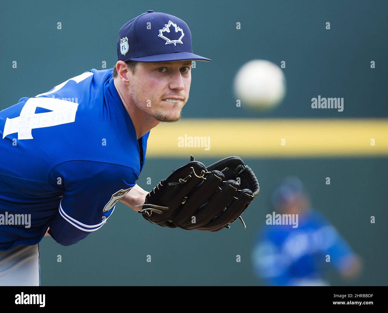 Toronto Blue Jays starting pitcher Lucas Harrell (64) warms up against ...