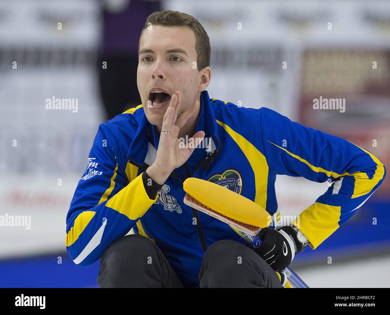 Alberta skip Brendan Bottcher directs the sweep against Newfoundland ...