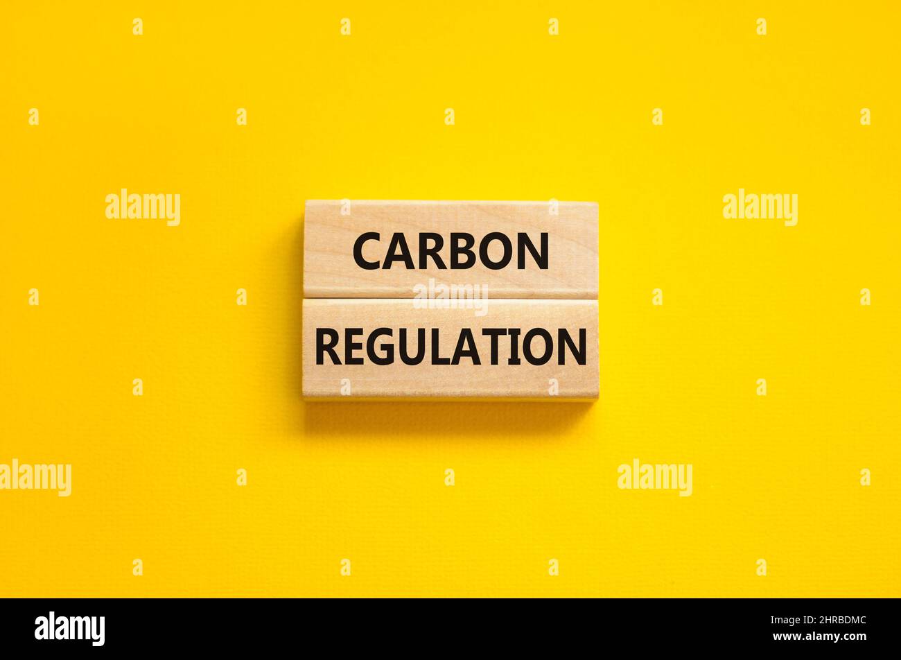 Carbon regulation symbol. Concept words Carbon regulation on wooden ...