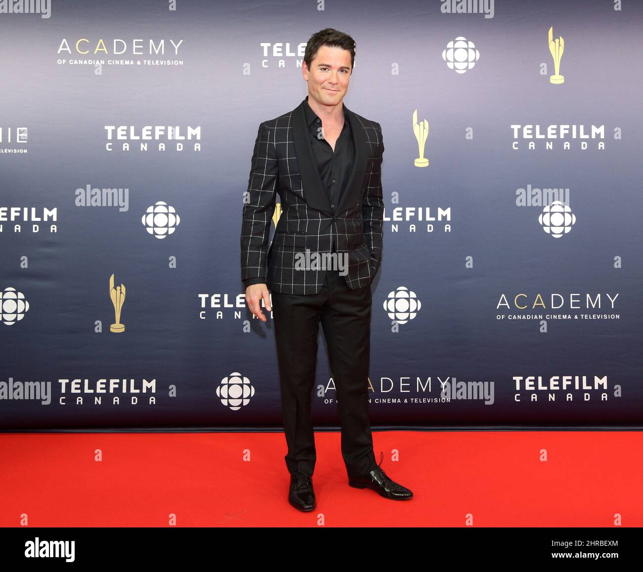 Yannick Bisson, star of "Murdoch Mysteries" poses on the red carpet at ...