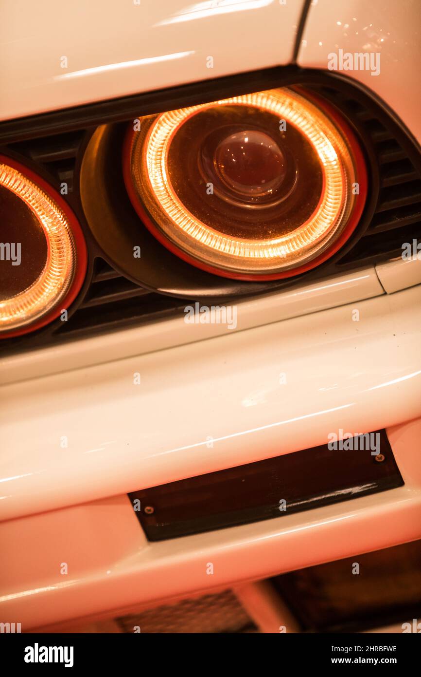 Closeup shot of the double headlight of a retro white car Stock Photo ...