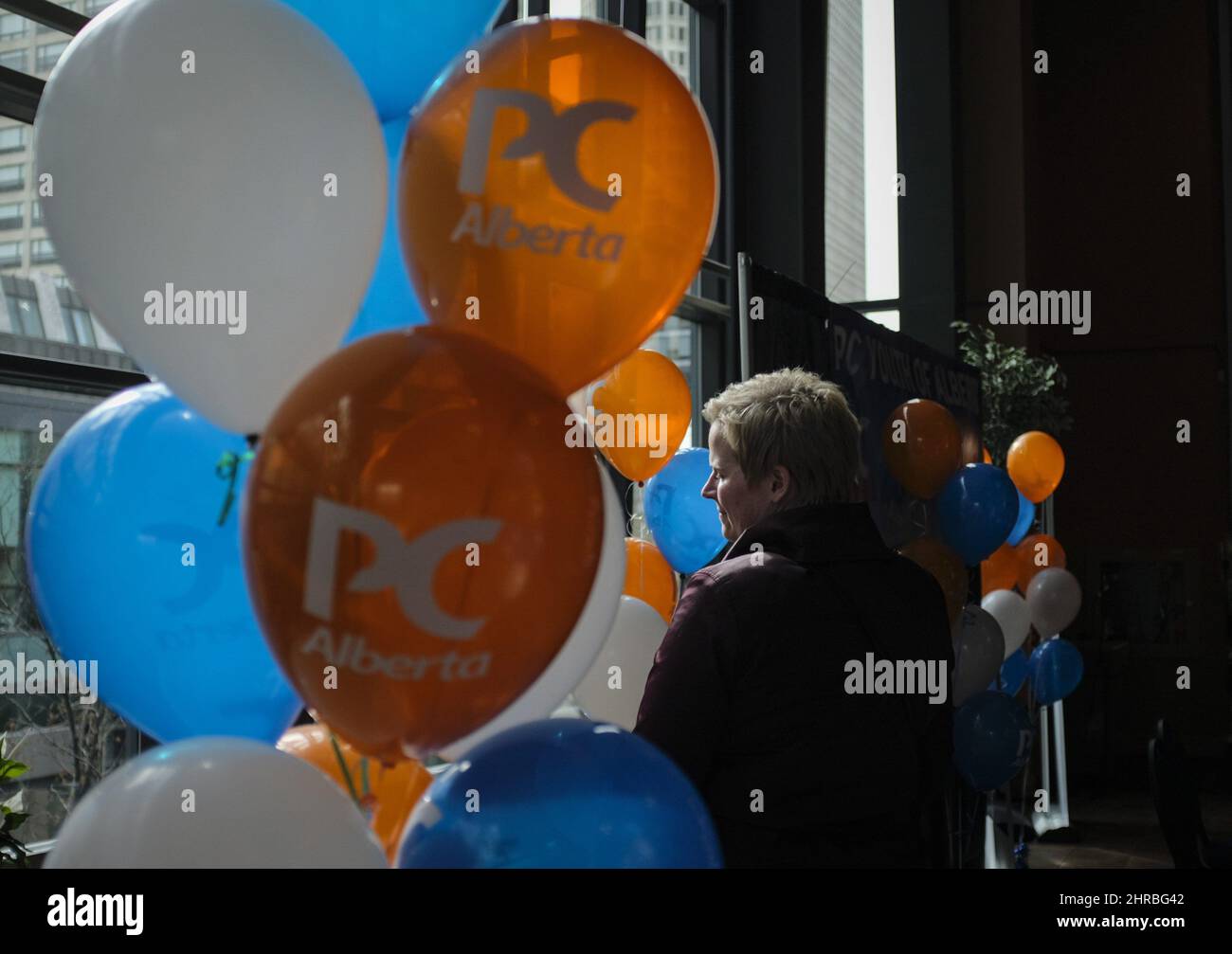Attendees wait for the doors to open at the Alberta PC Party leadership ...