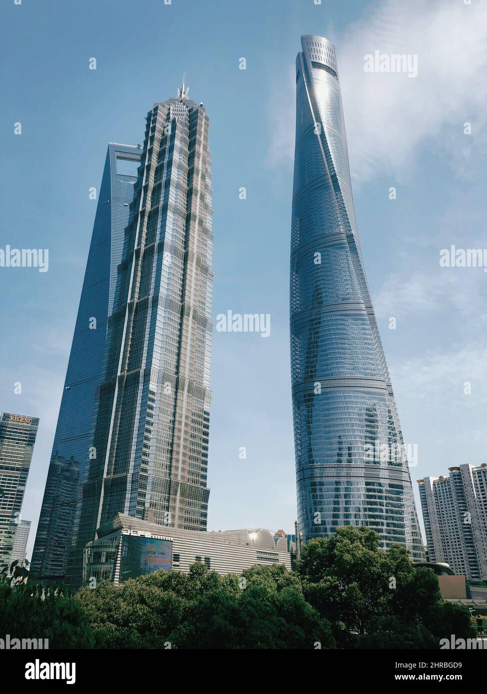 Vertical low angle shot of the Jin Mao Tower with SWFC and Shanghai ...