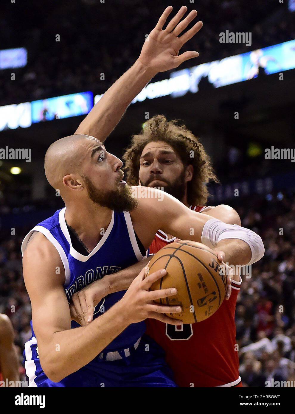 Chicago Bulls center Robin Lopez (8) tries to block as Toronto Raptors ...