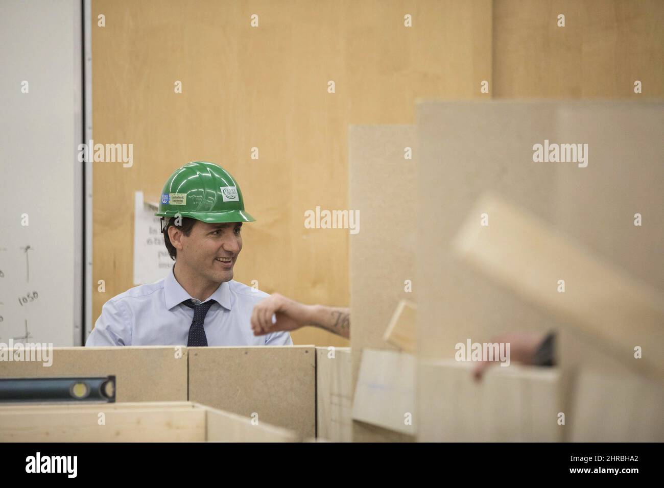 Prime Minister Justin Trudeau talks with students during a visit to the ...