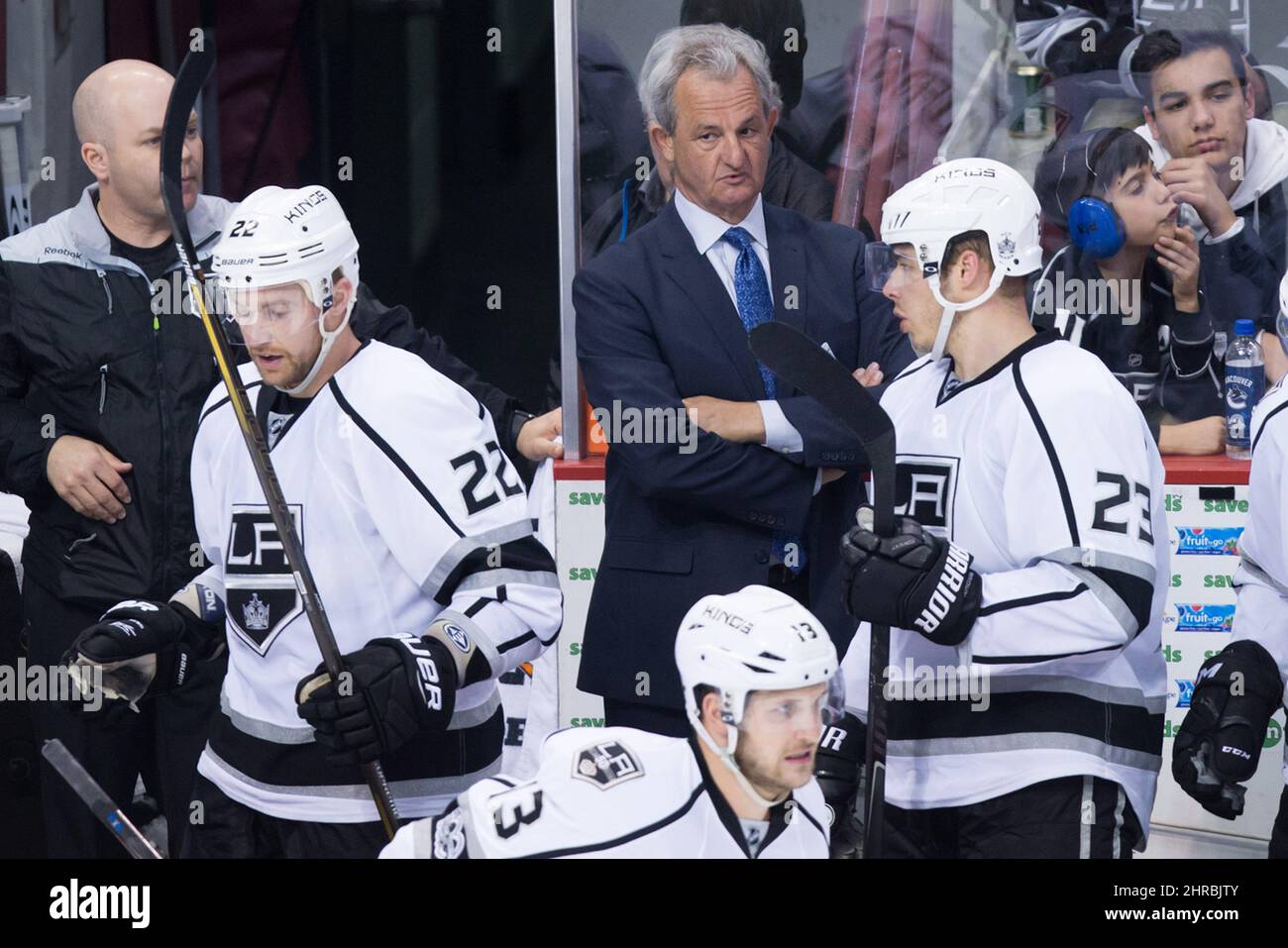 Los Angeles Kings coach Darryl Sutter, centre, stands on the bench ...