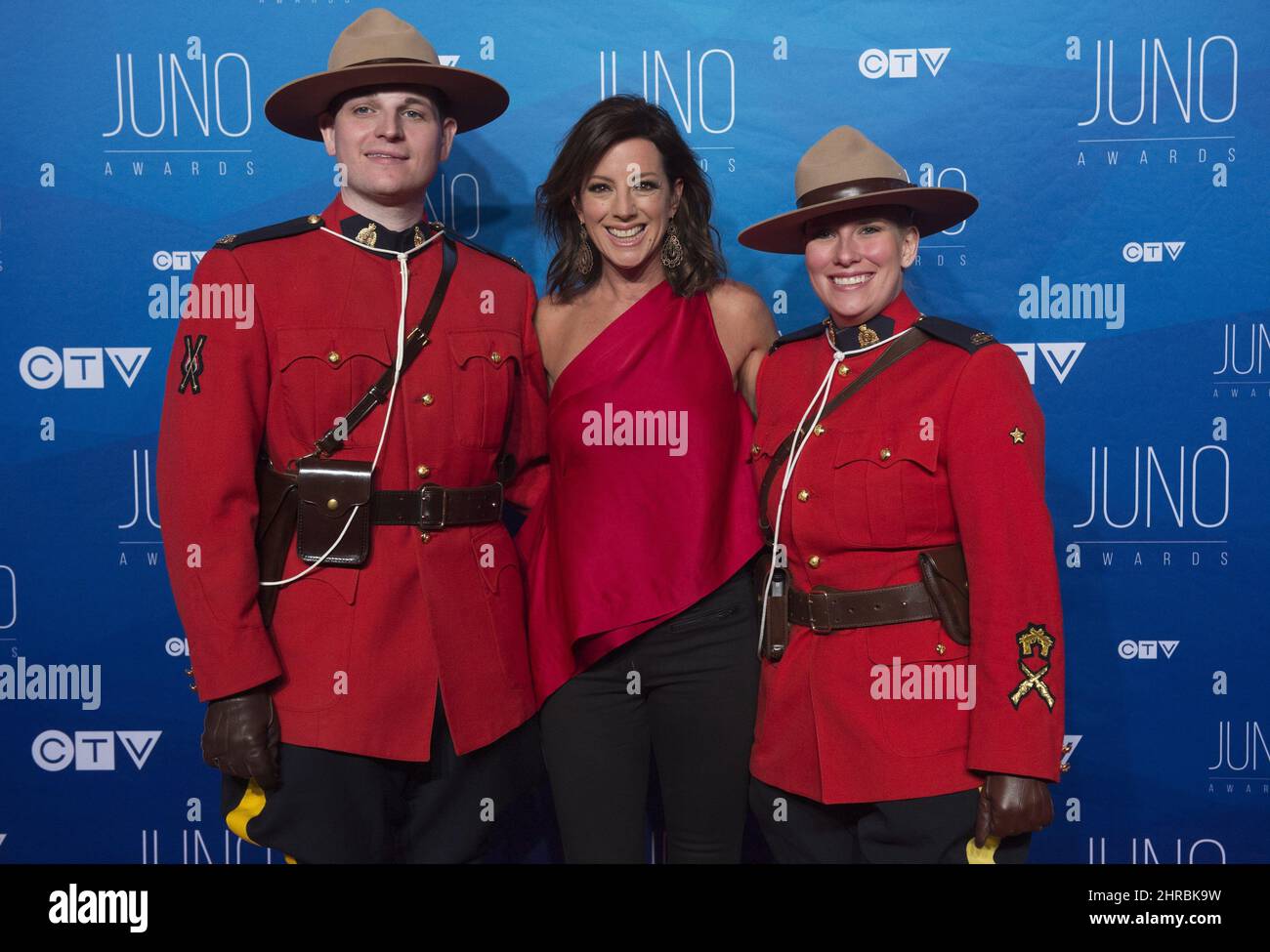 Sarah McLachlan poses with RCMP Constables Marie-Michele Ouimet and ...