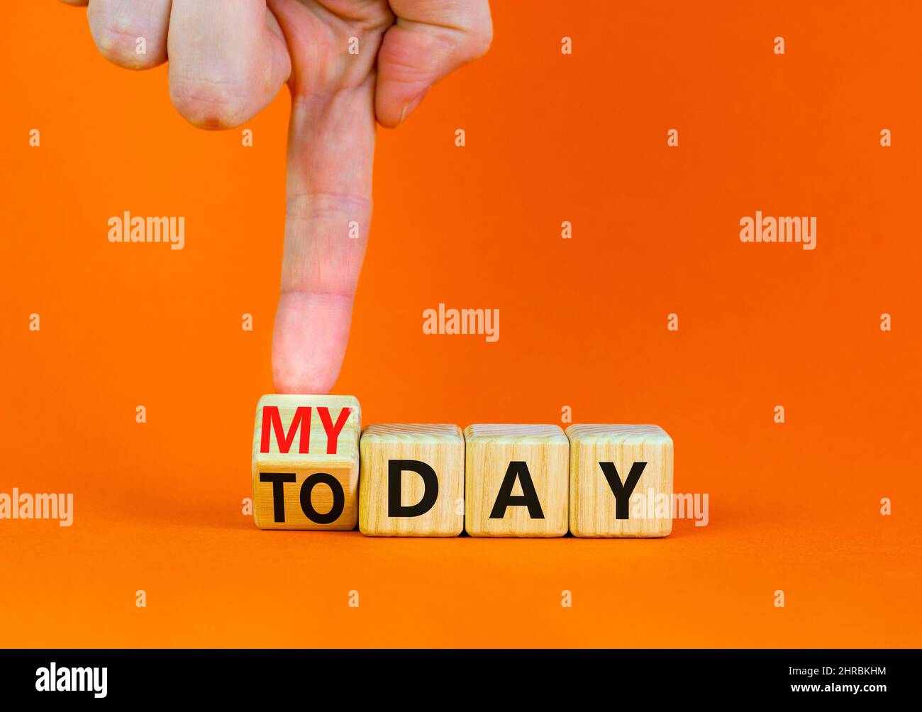 Today is my day symbol. Businessman turns the wooden cube and changes ...
