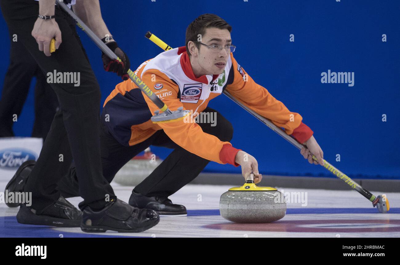 Netherlands skip Jaap von Dorp makes a shot during the 15th draw ...