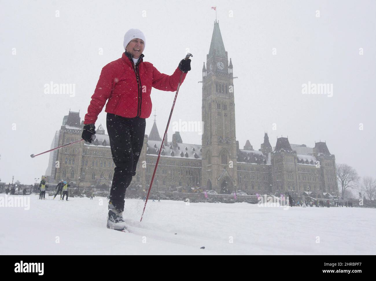 Senator Nancy Greene skies around the front lawn of the Parliament ...