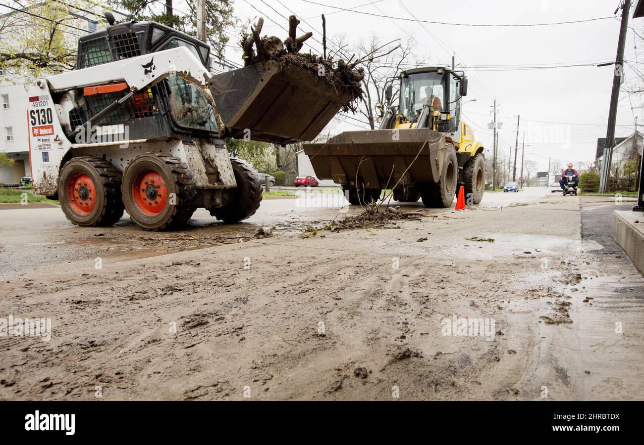 Crews work to clean-up mud and debris in Dundas, Ont., on Friday, April ...