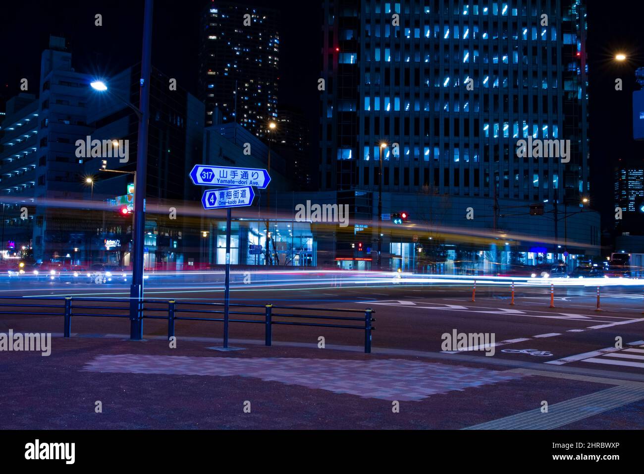 A night traffic jam at the city crossing in Tokyo wide shot Stock Photo ...