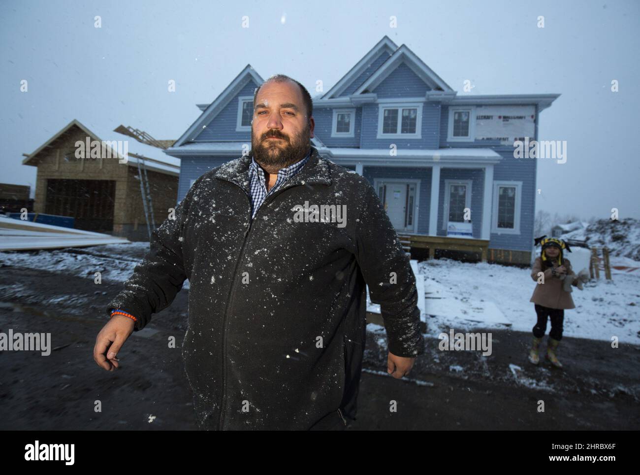 Chris Flett and his daughterJessica are shown at his new Beacon Hill ...