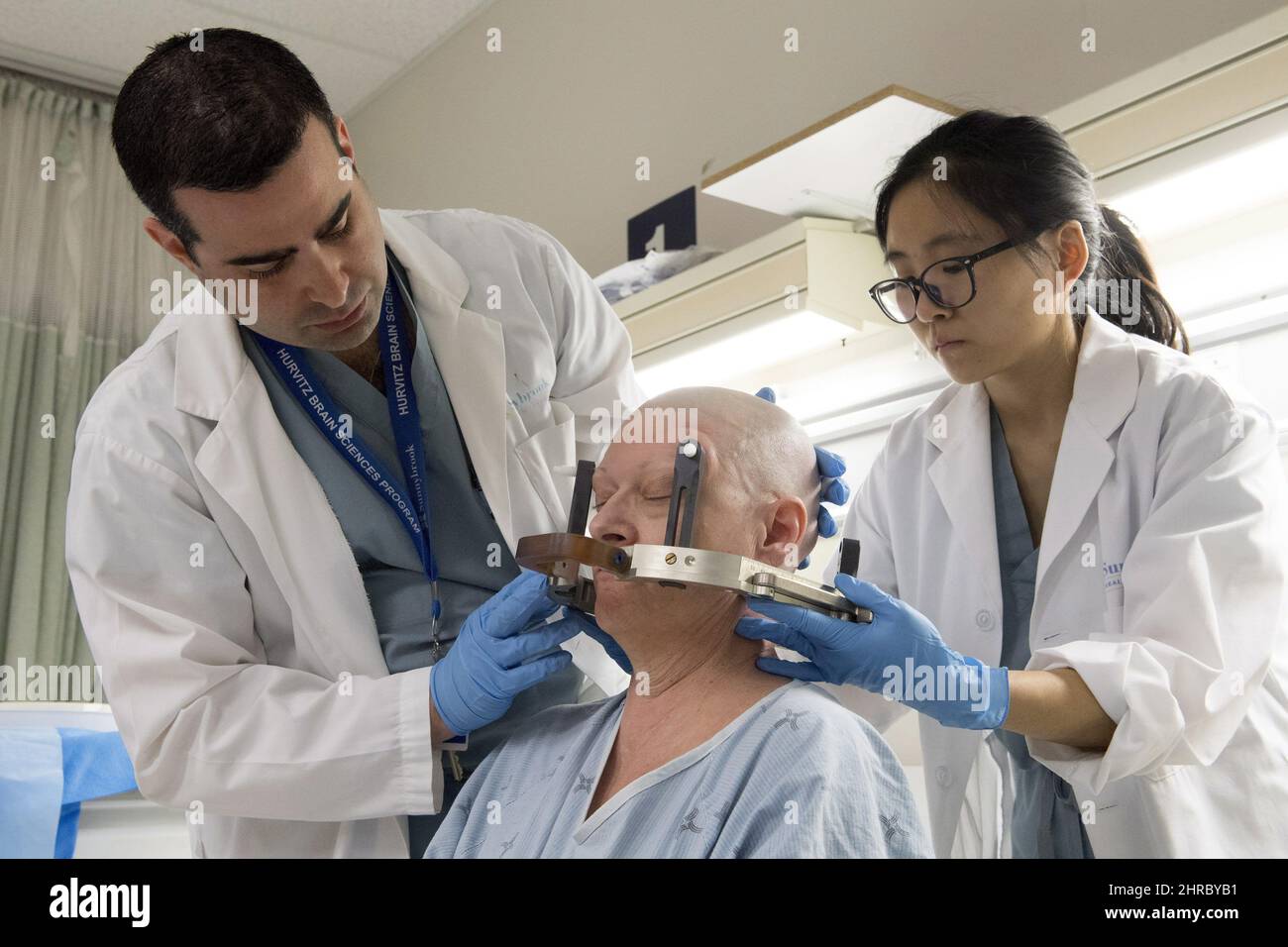 Neurosurgeon Dr. Nir Lipsman (left) and Resident Dr. Ying Meng (right ...