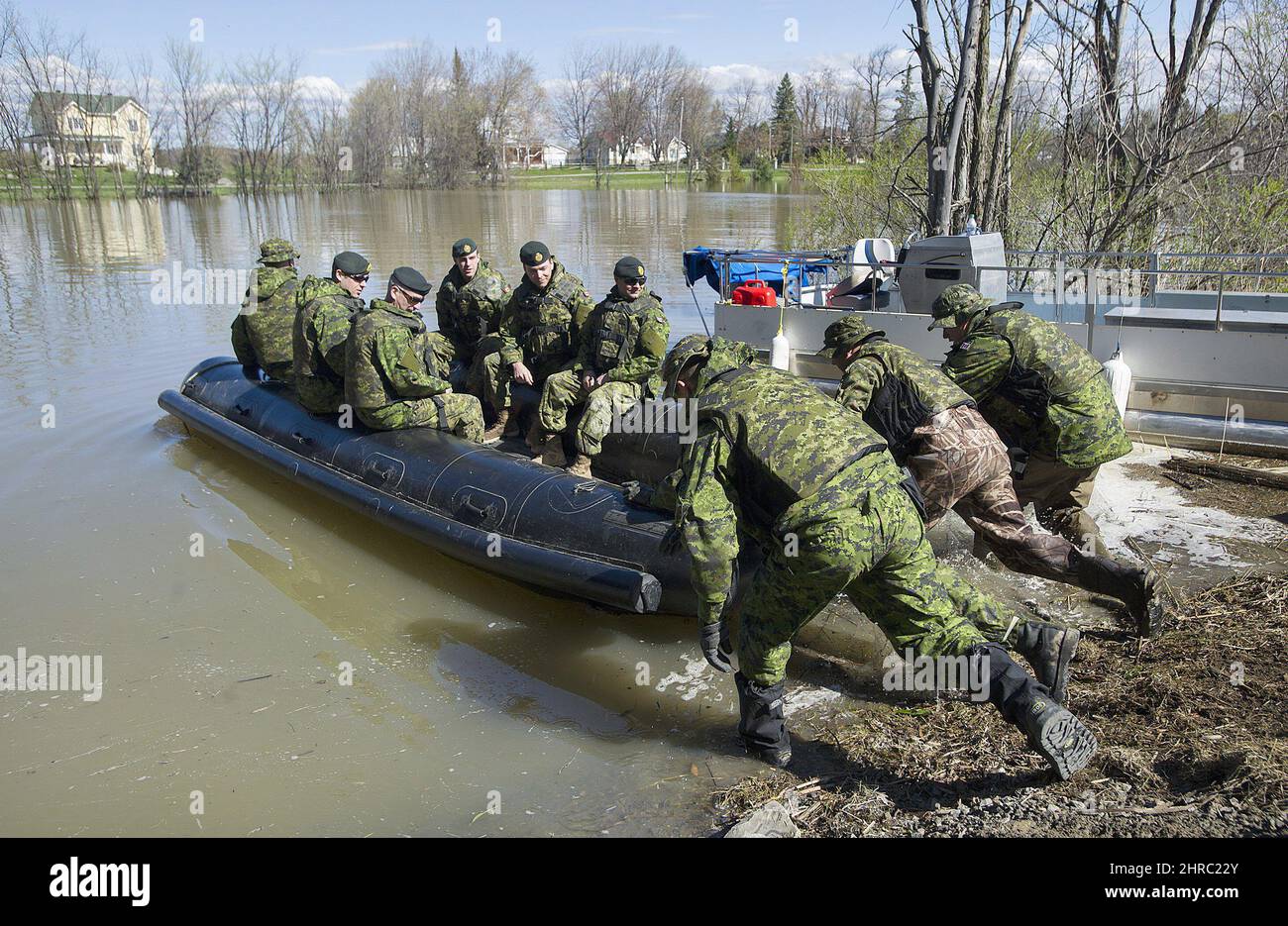 Canadian Forces personnel launch an assault boat as they head out to ...