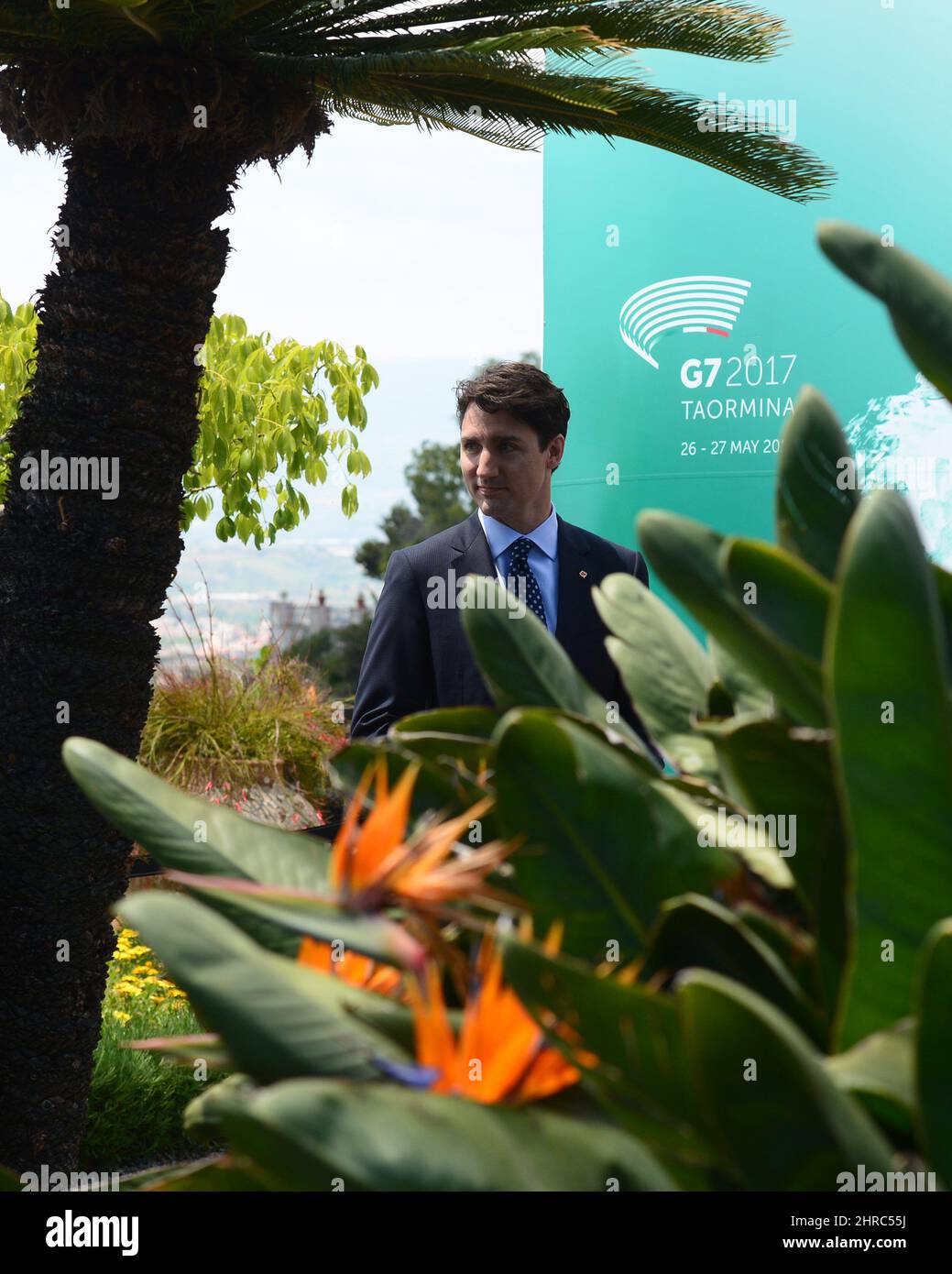 Prime Minister Justin Trudeau, right, leaves following a photo with G7 ...