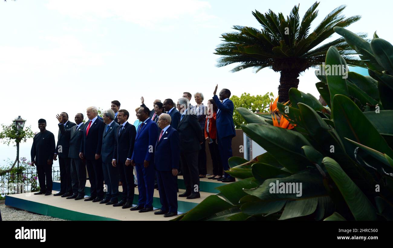 G7 and African leaders take part in a family photo at the G7 Summit in ...