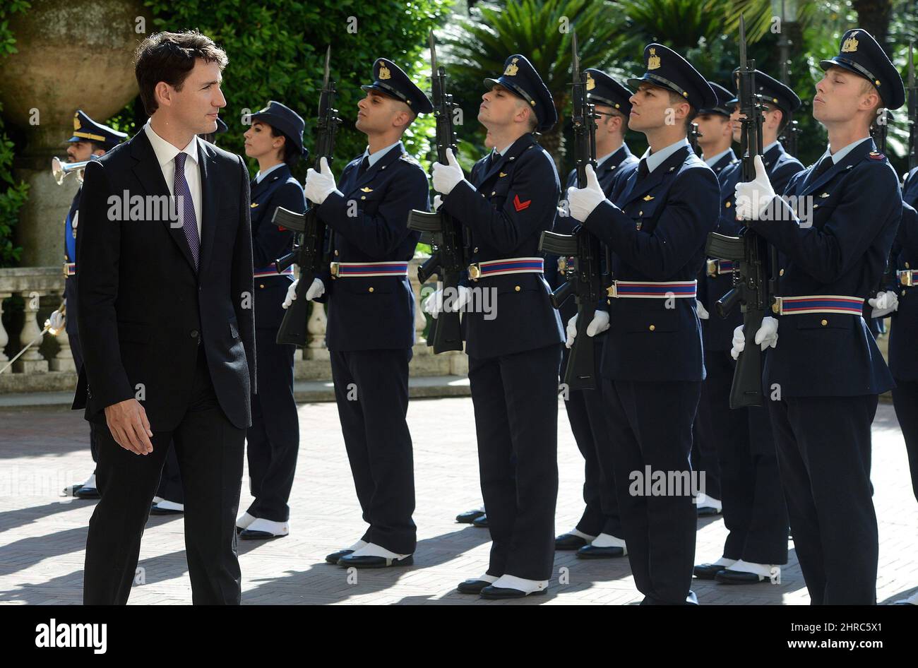 Prime Minister Justin Trudeau inspects the Presidential Guard as he ...