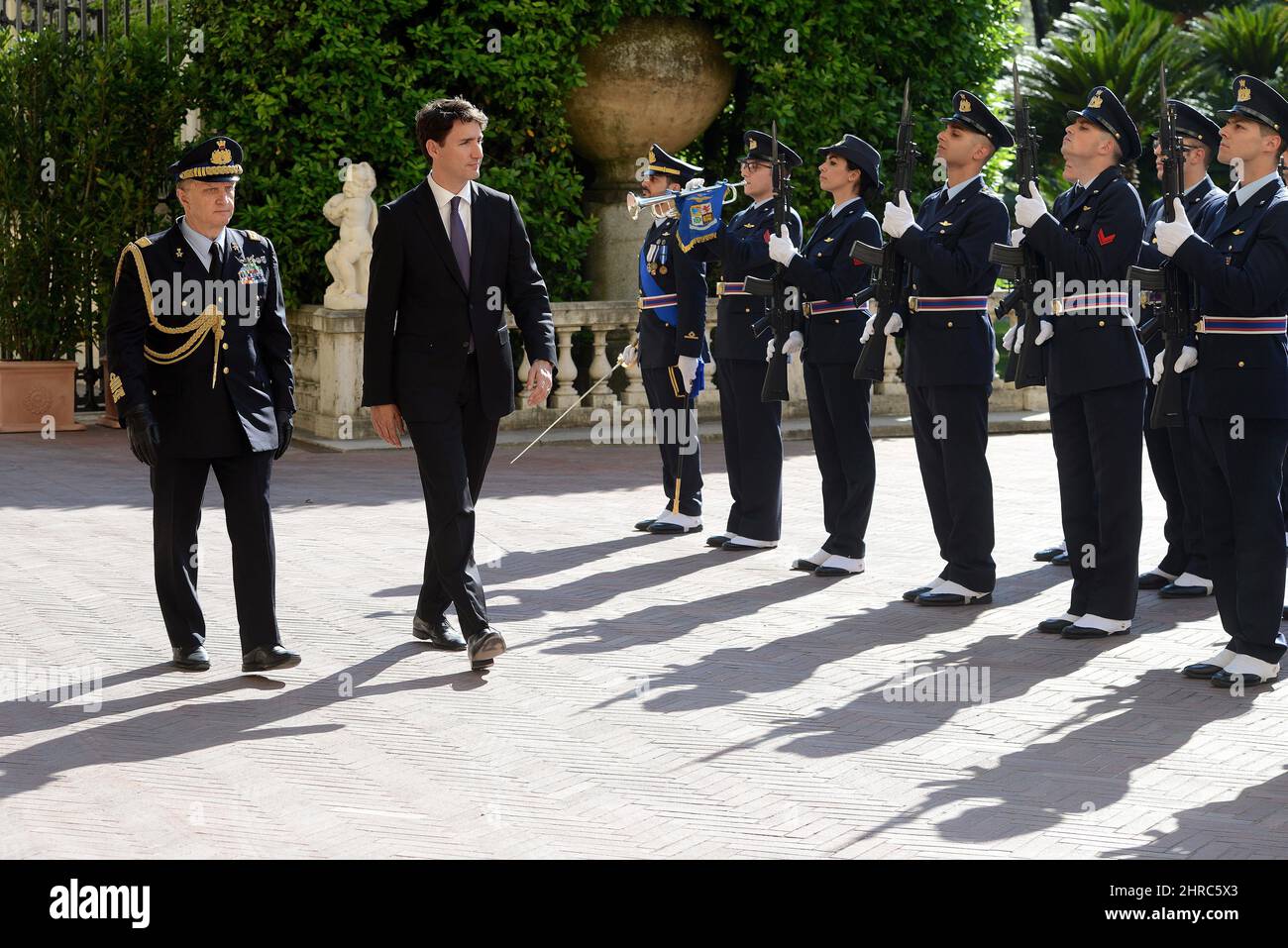 Prime Minister Justin Trudeau inspects the Presidential Guard as he ...