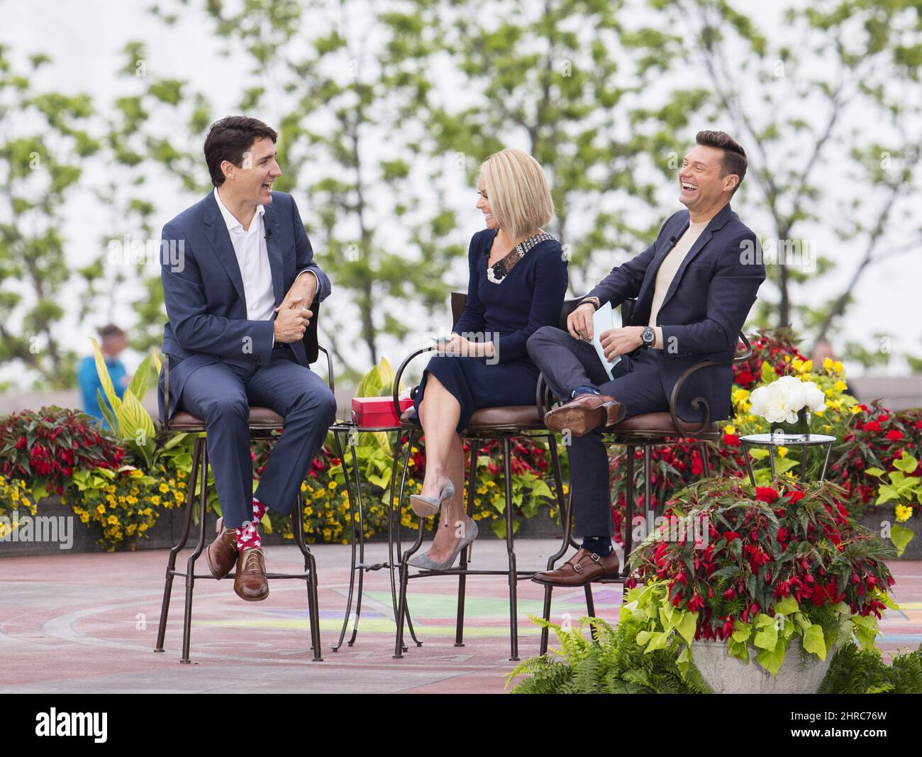 Prime Minister Justin Trudeau, left, speaks with Kelly Ripa, centre ...