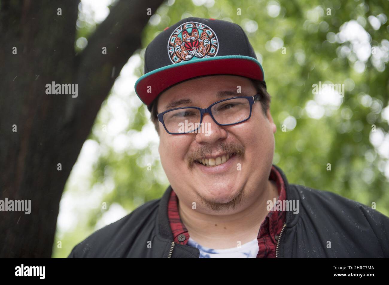 Indigenous poet Jordan Abel is shown during an interview with The ...