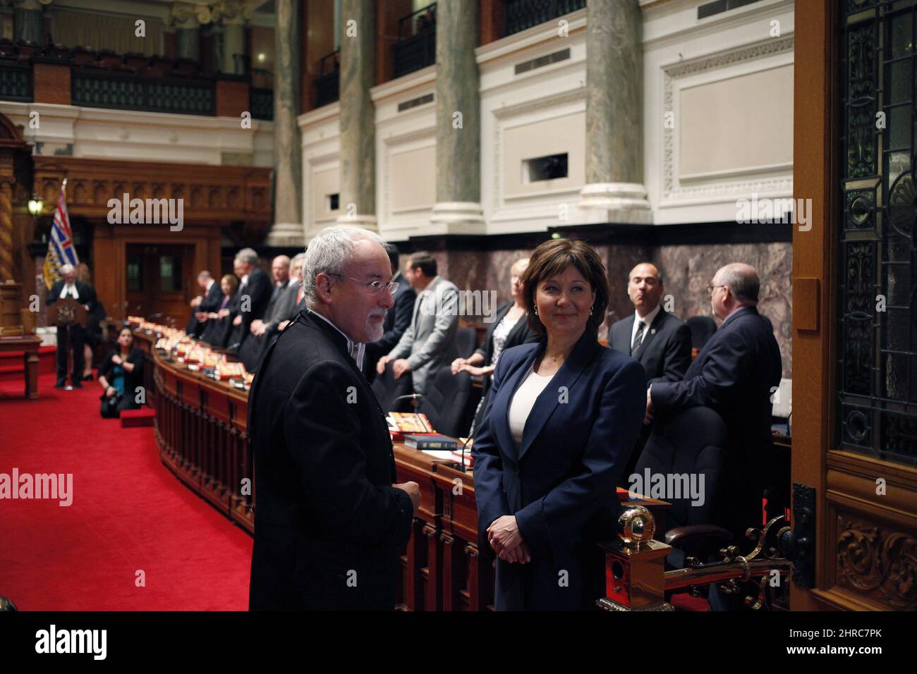 B.C. Premier Christy Clark talks with Sergeant at Arms Gary Lenz as she ...