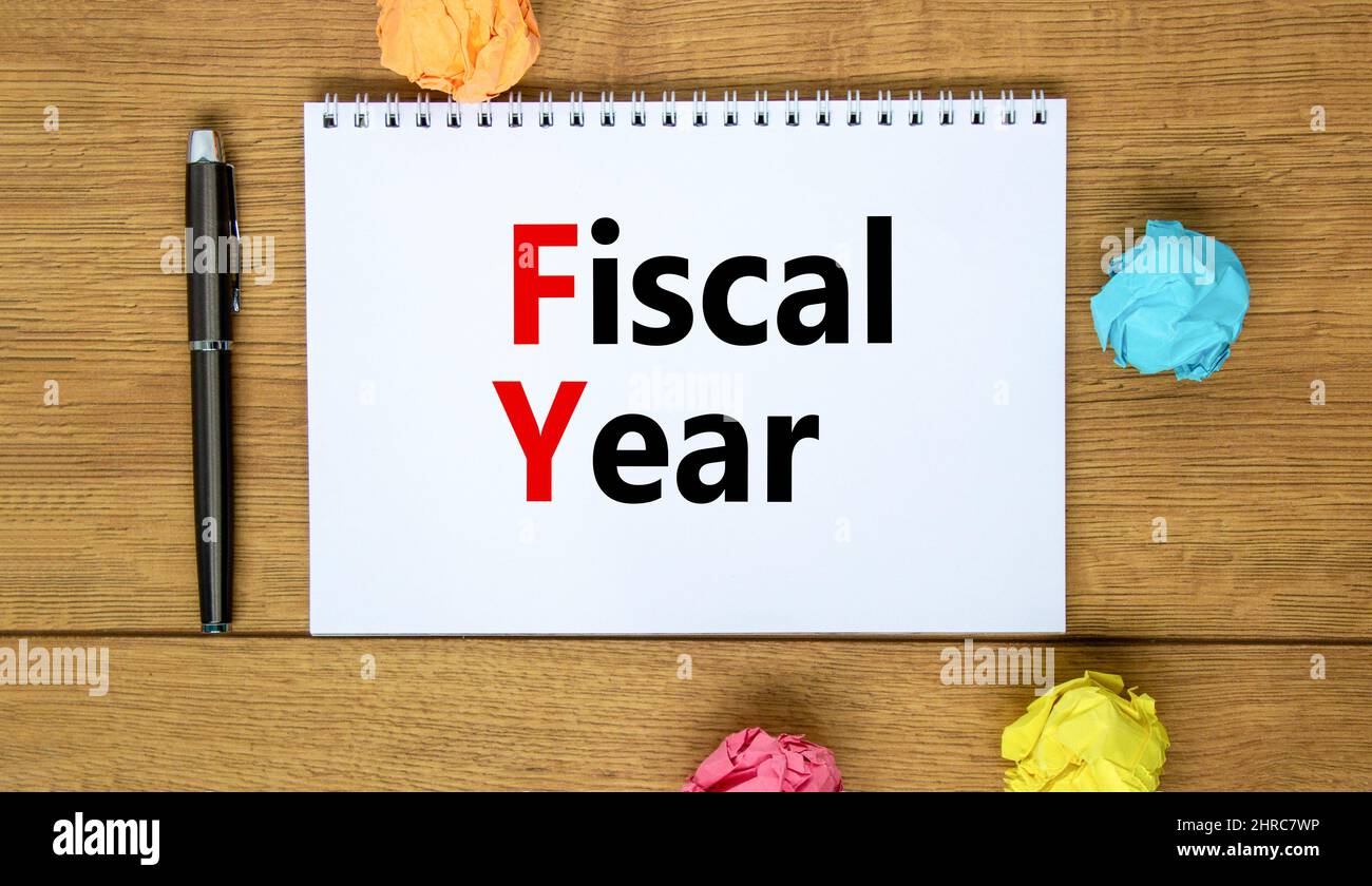 FY Fiscal year symbol. Concept words FY Fiscal year on white note ...