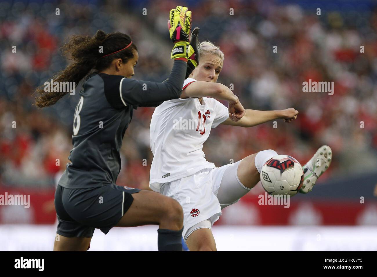 Canada's midfielder Sophie Schmidt (13) attempts to get the ball past ...