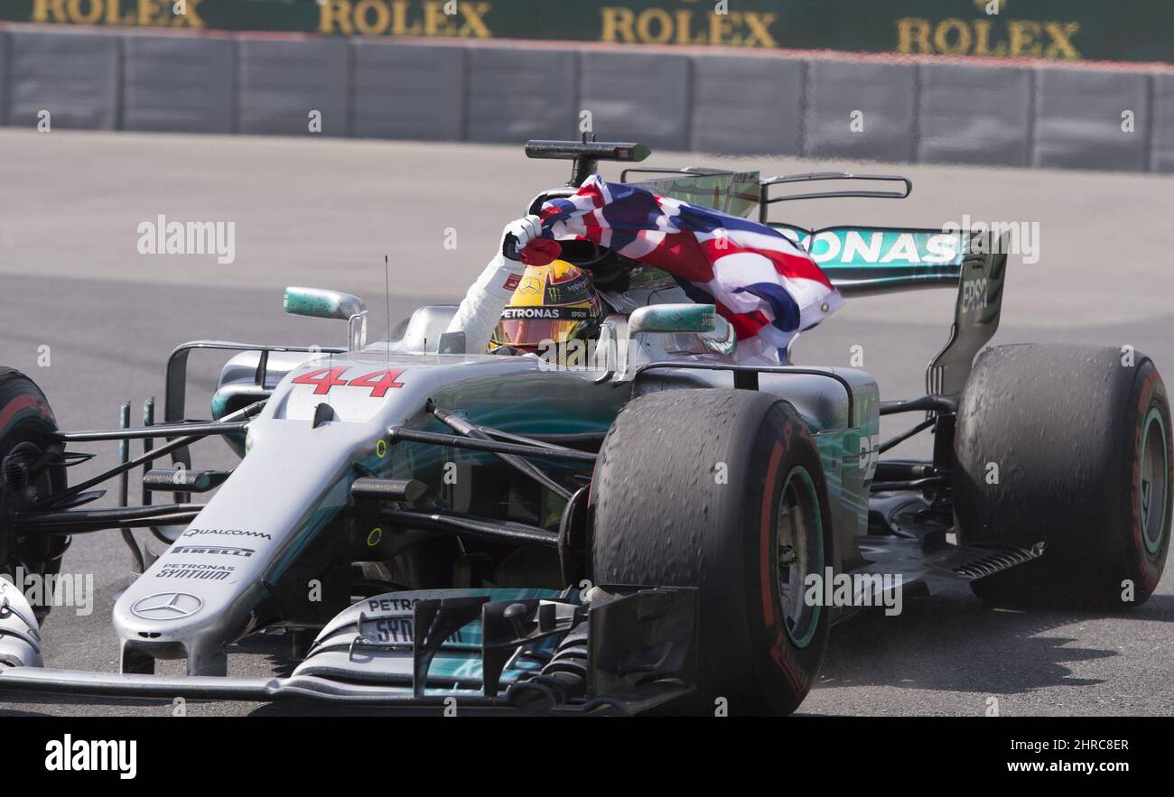 Mercedes driver Lewis Hamilton (44) of Great Britain waves the British ...