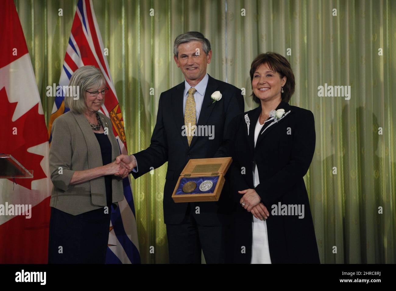 Attorney General and Minister of Justice Andrew Wilkinson, shakes hands ...