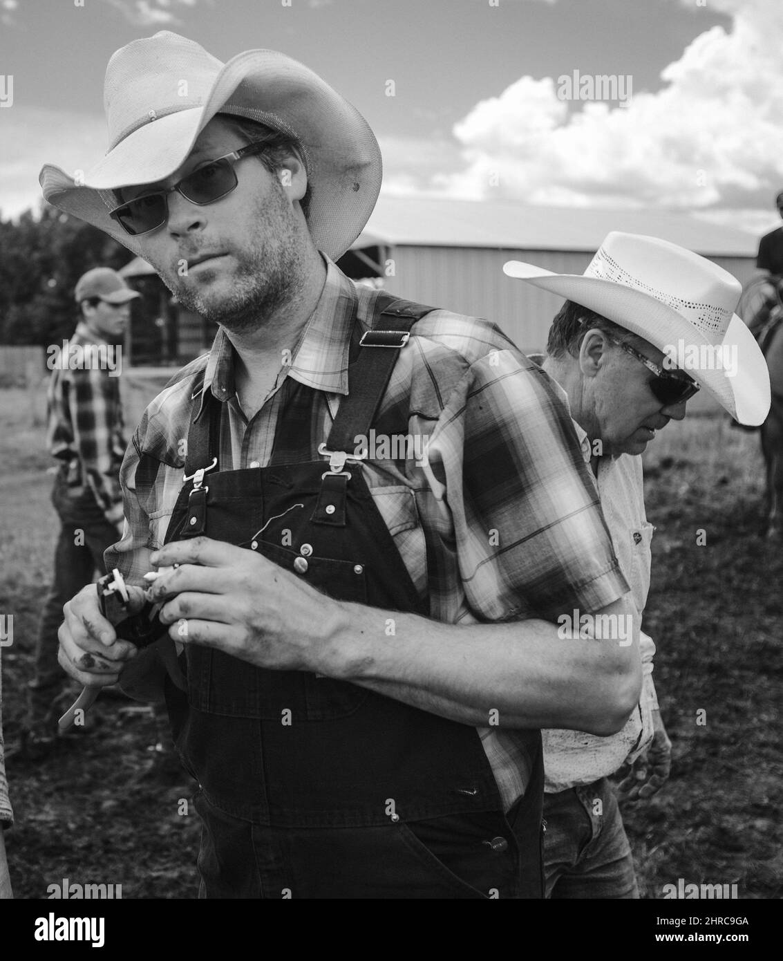 Kurt Reid, left, and Richard Sheehan, at a branding on a family farm ...