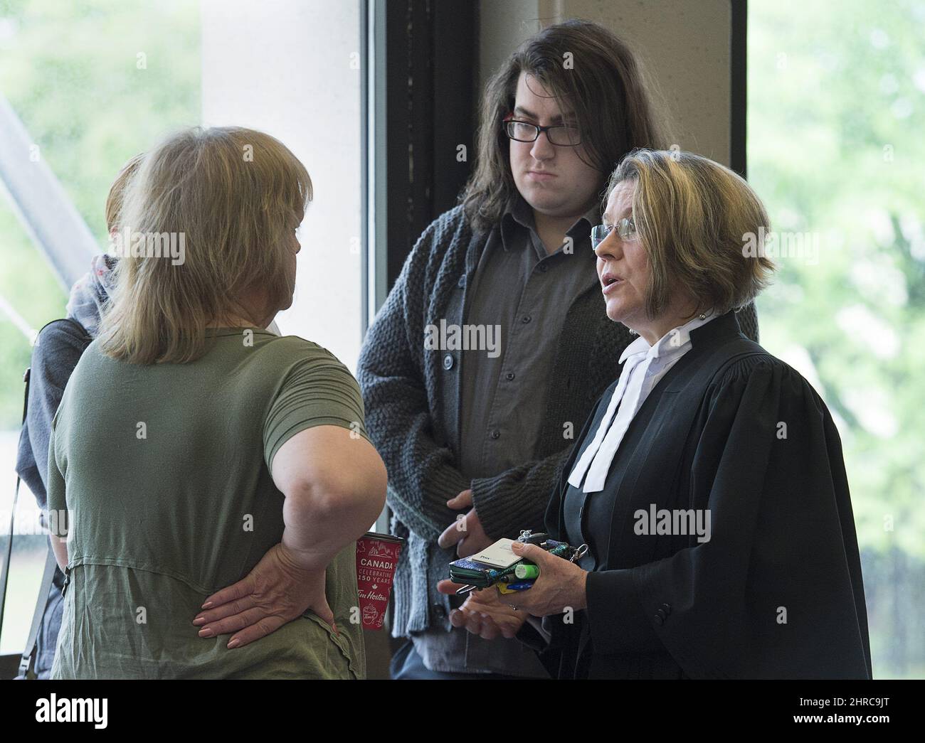 Crown attorney, Susan MacKay, right, chats with Taylor Samson's mother ...