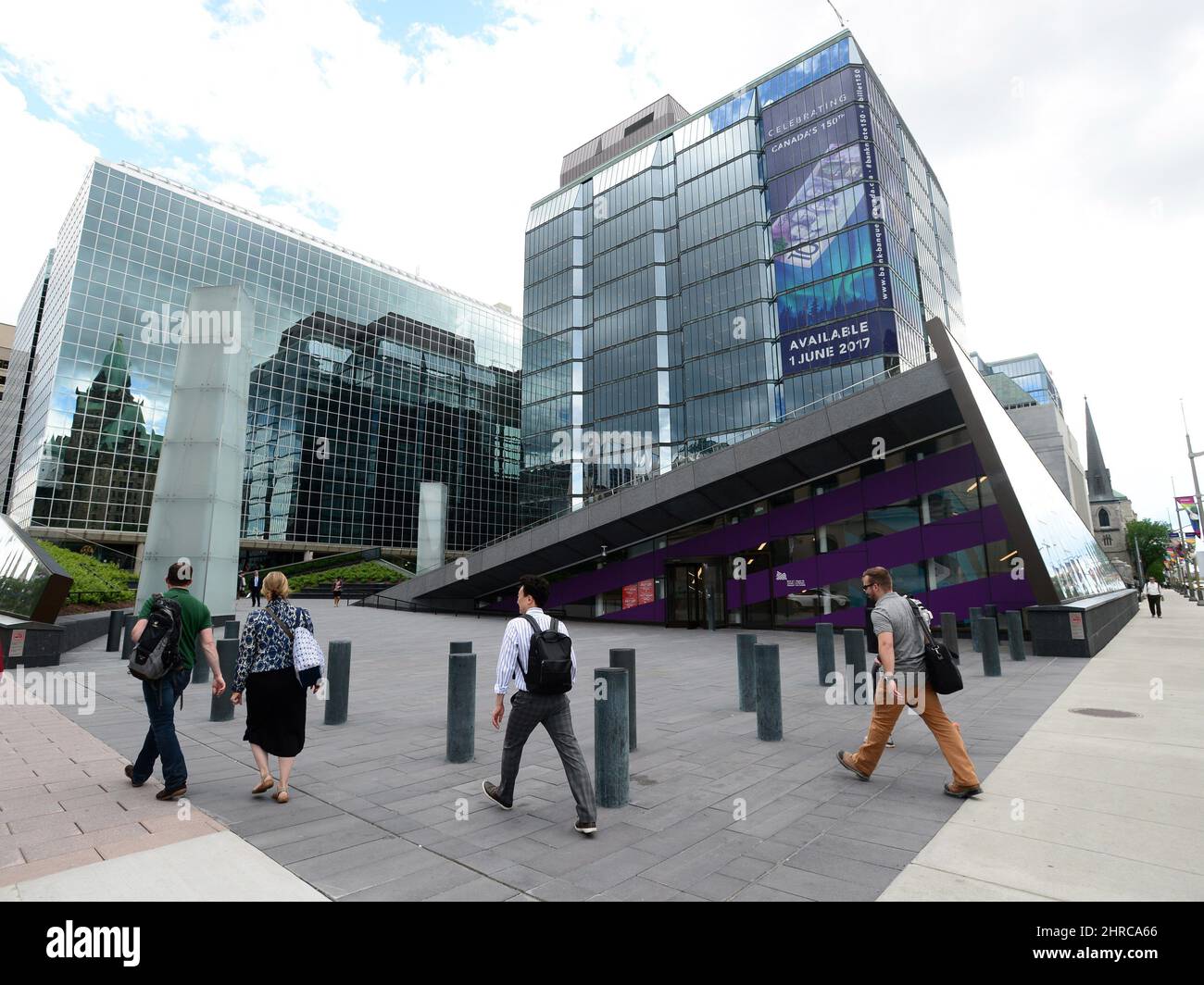 Pedestrians make their way past the front entrance to the newly ...