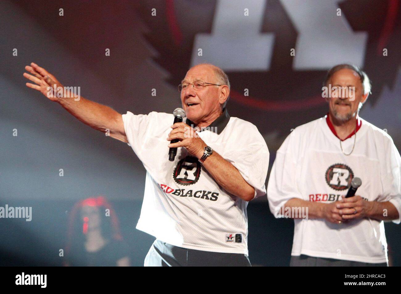 Former Ottawa Rough Riders football player Tony Gabriel, right, and ...