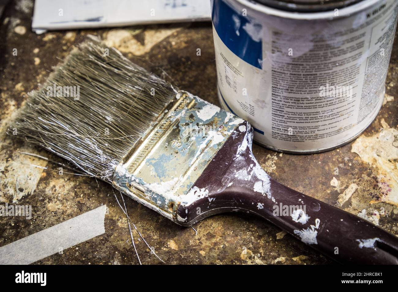 Paint Brush on a rusted metal table Stock Photo - Alamy