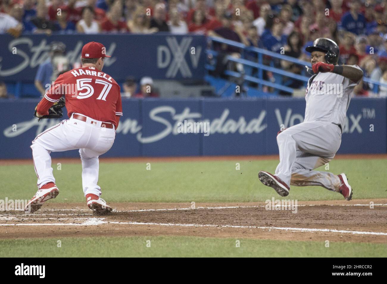 Toronto Blue Jays relief pitcher Lucas Harrell (left) waits at home ...