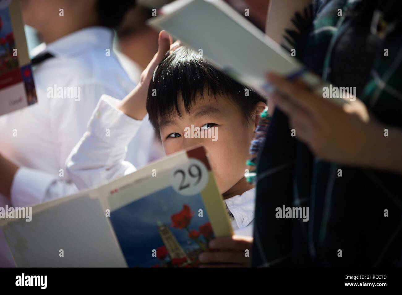 Jason Tian, 7, from China, takes the oath of citizenship with his ...