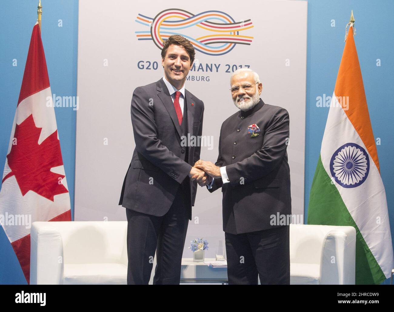 Prime Minister Justin Trudeau shakes hands with Indian Prime Minister ...