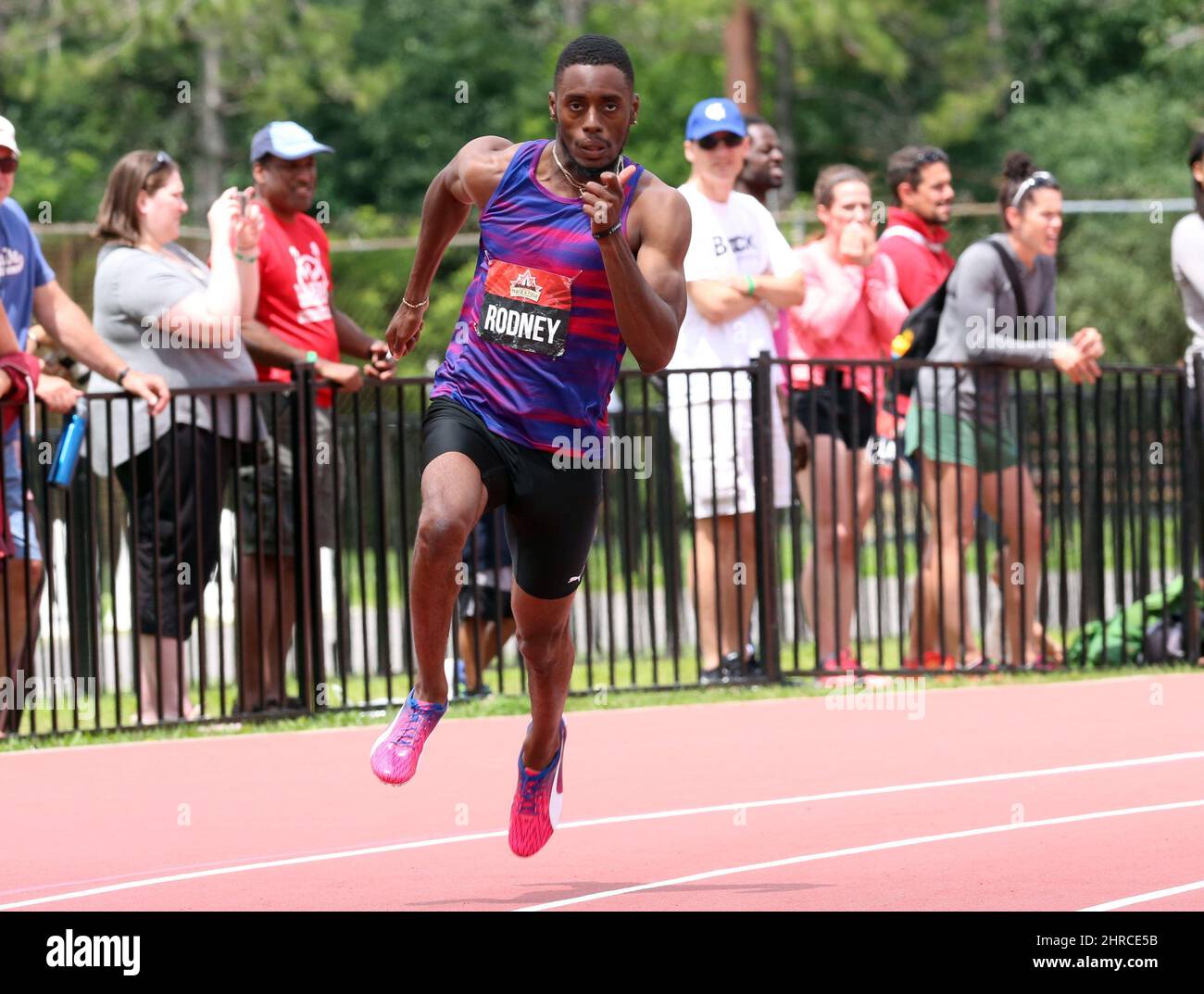 Brendon Rodney rounds the bend to win his heat in the preliminary men's ...