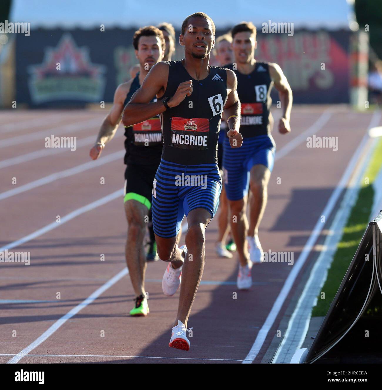 Brandon McBride, of Windsor, Ont., crosses the finish line to win gold ...