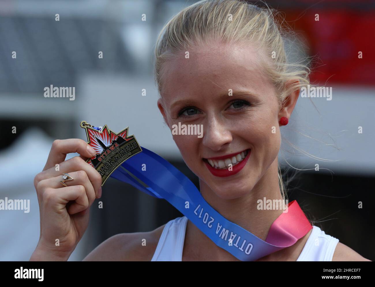 Sage Watson of Medicine Hat, Alta., displays her gold medal after ...