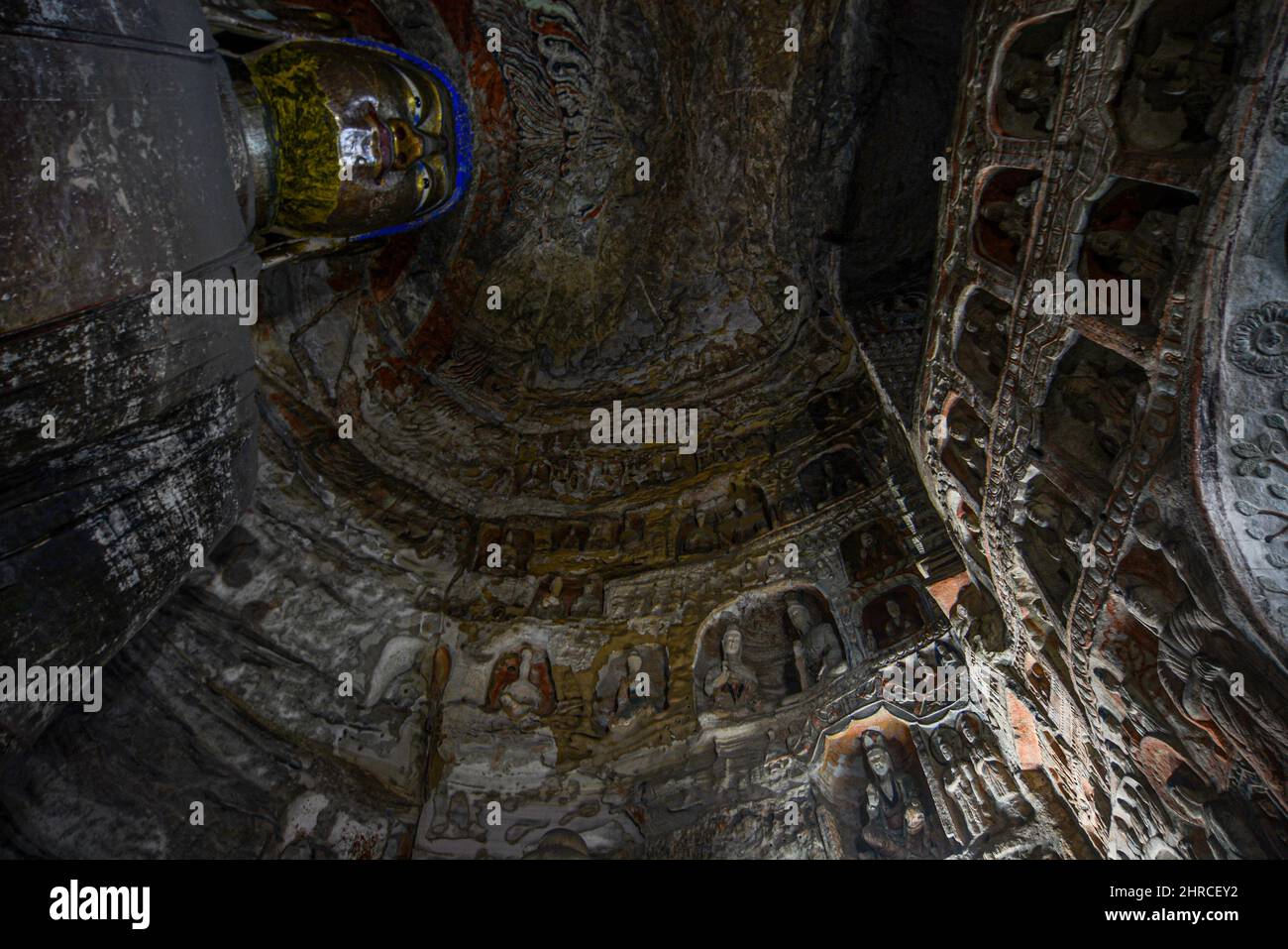 Buddhist statues in the Chinese Yungang Grottoes temple of Datong City ...