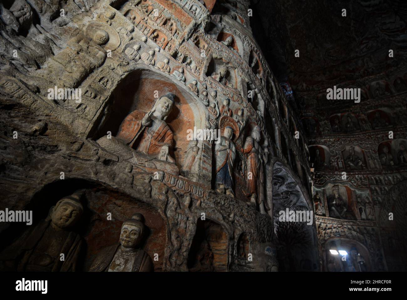 Buddhist statues in the Chinese Yungang Grottoes temple of Datong City ...