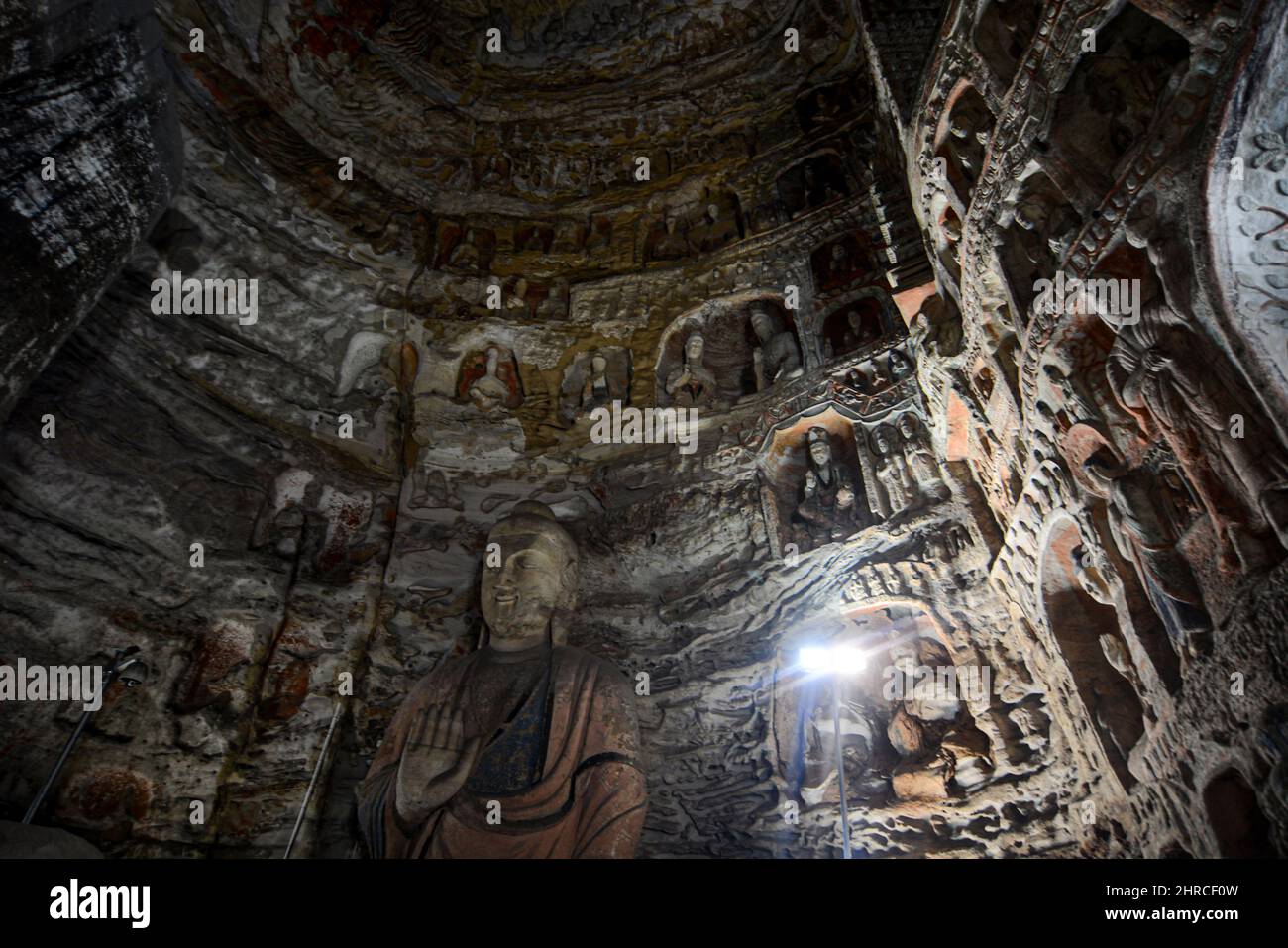 Buddhist statues in the Chinese Yungang Grottoes temple of Datong City ...