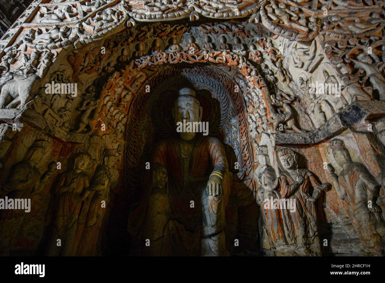 Buddhist statues in the Chinese Yungang Grottoes temple of Datong City ...