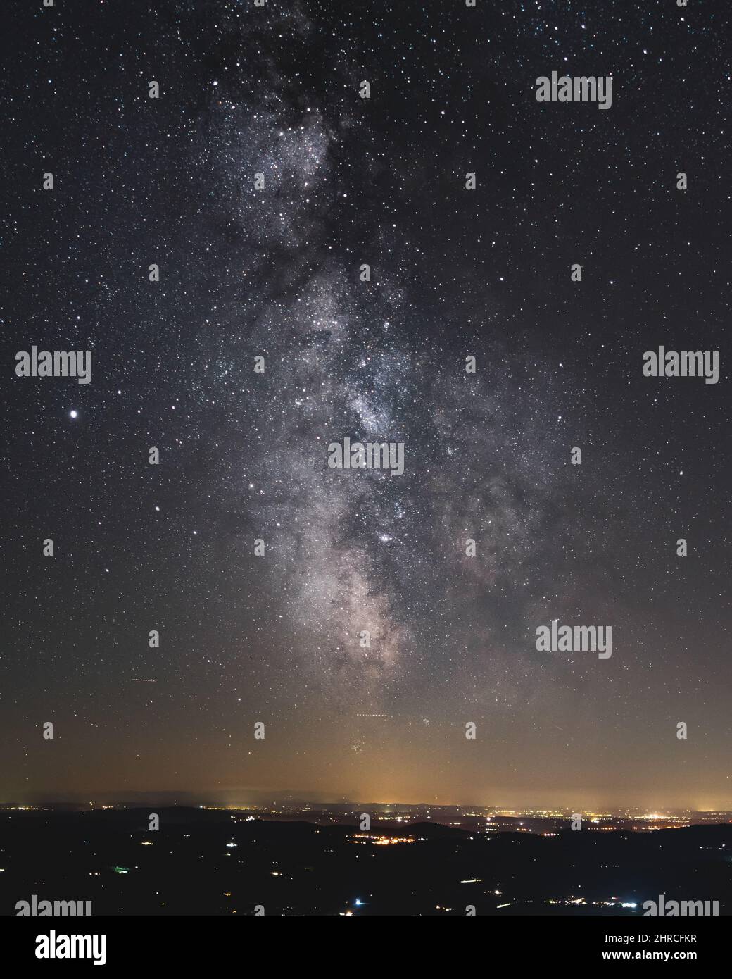 Vertical of the Milky Way illuminating the night sky under the ...